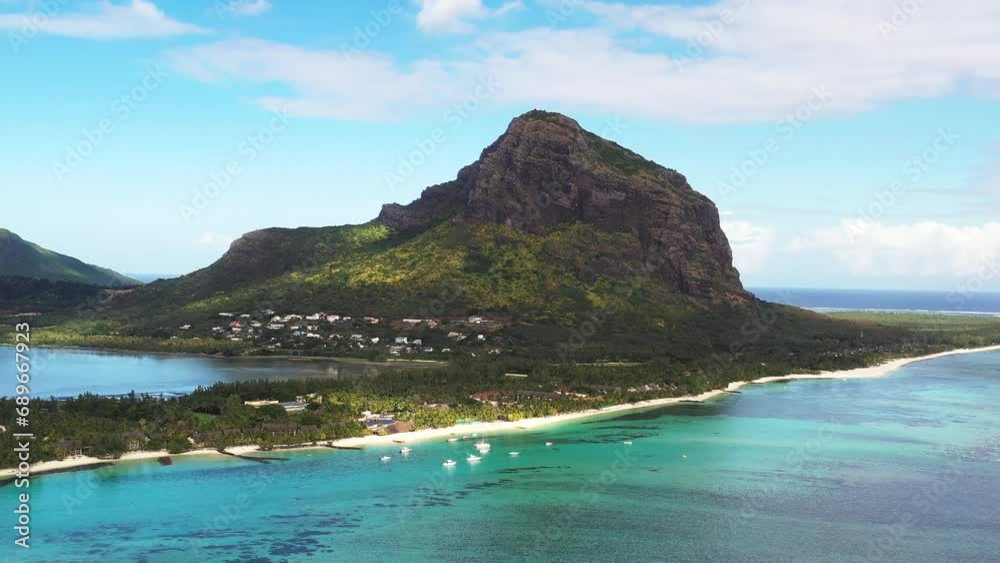 Panoramic aerial drone view of iconic Le Morne mountain with resorts on ...