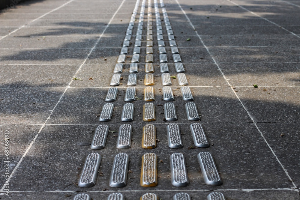 Pedestrian paths, Braille blocks in tactile paving for the blind ...
