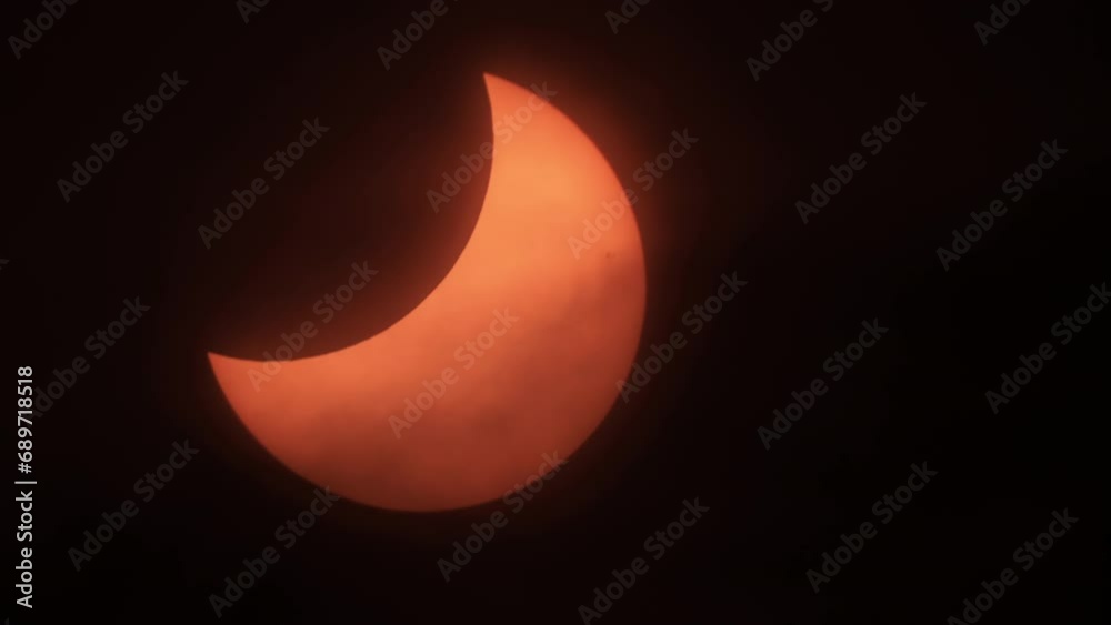 Movement of Clouds in Front of Sun During a Solar Eclipse. Moon Cast ...