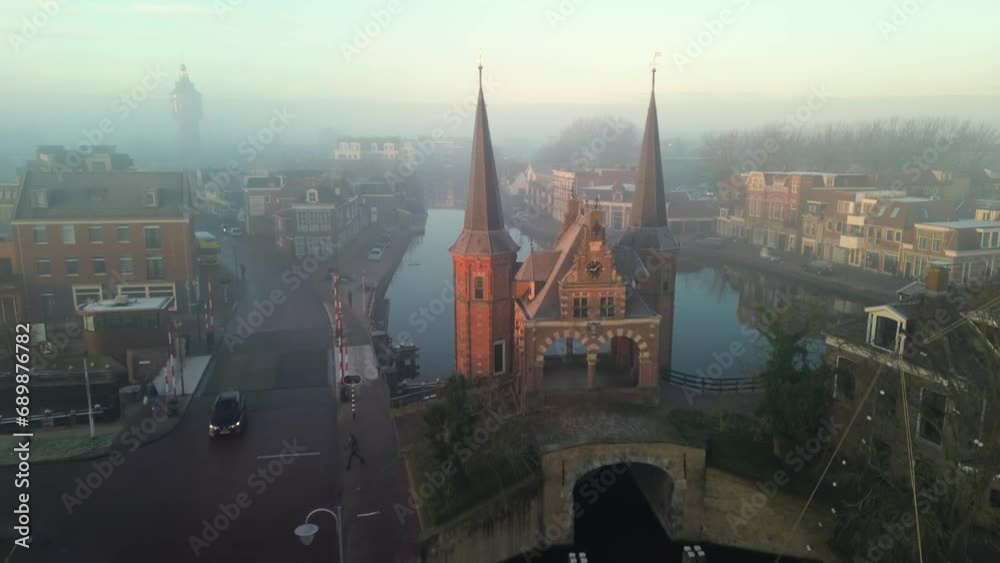 Drone view across city of Sneek with historic, iconic Watergate ...