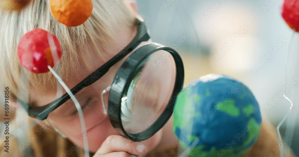 Planets, science and kids with magnifying glass for education, creative ...