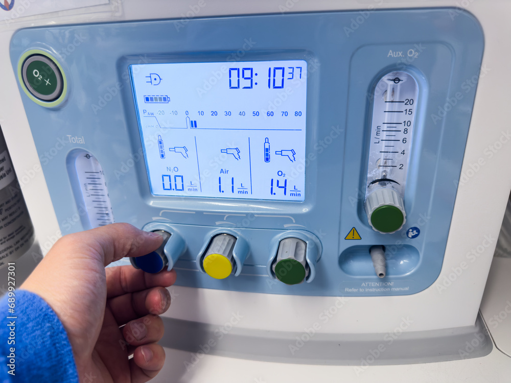 Modern hospital anesthesia machine with intricate ventilation tubing ...