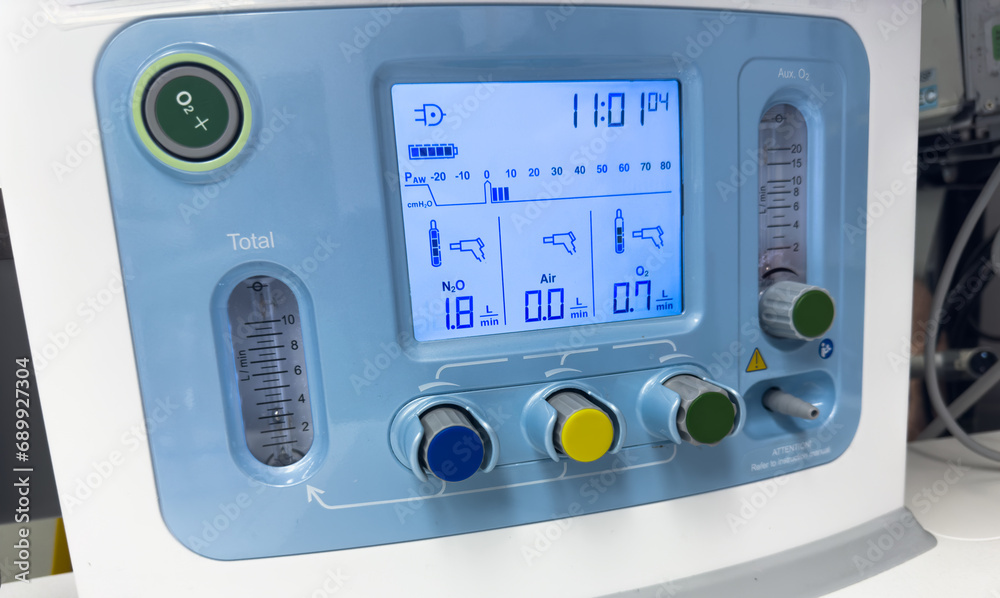 Modern hospital anesthesia machine with intricate ventilation tubing ...
