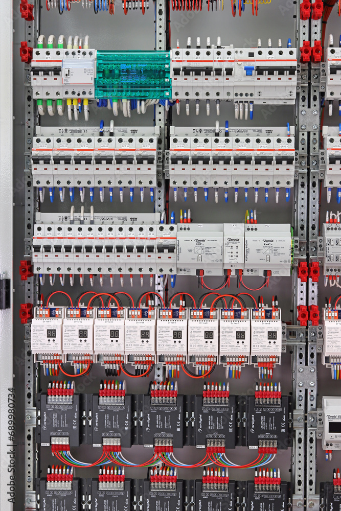 Electronic control modules for apartment automation are installed in an ...