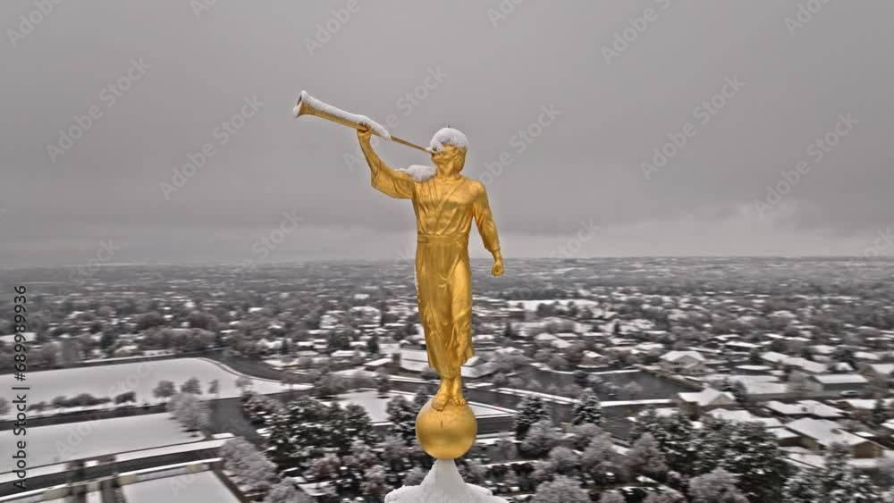Snow covered golden angel moroni on trumpet atop Provo LDS Mormon ...
