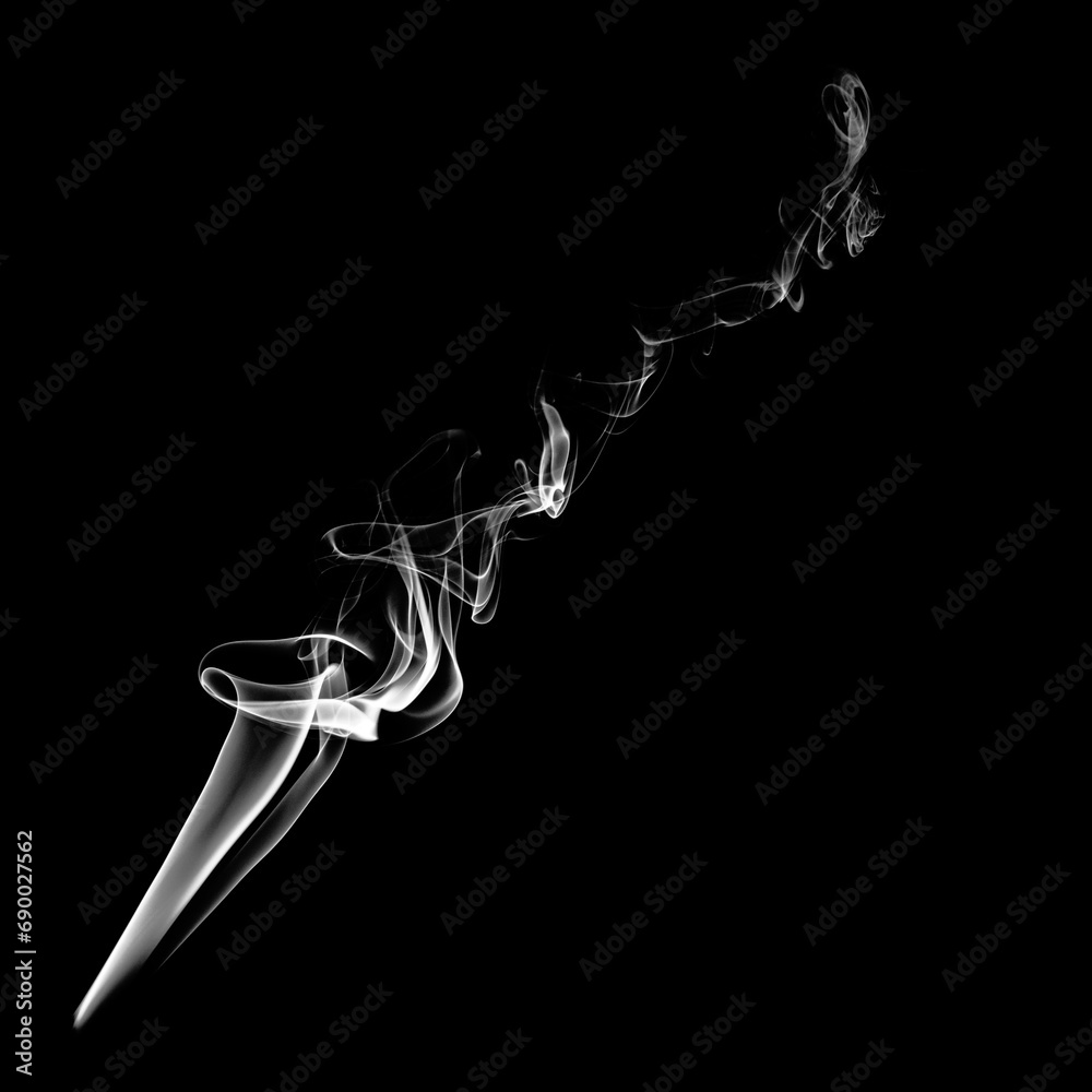 Abstract white puffs of smoke swirl overlay on black background ...