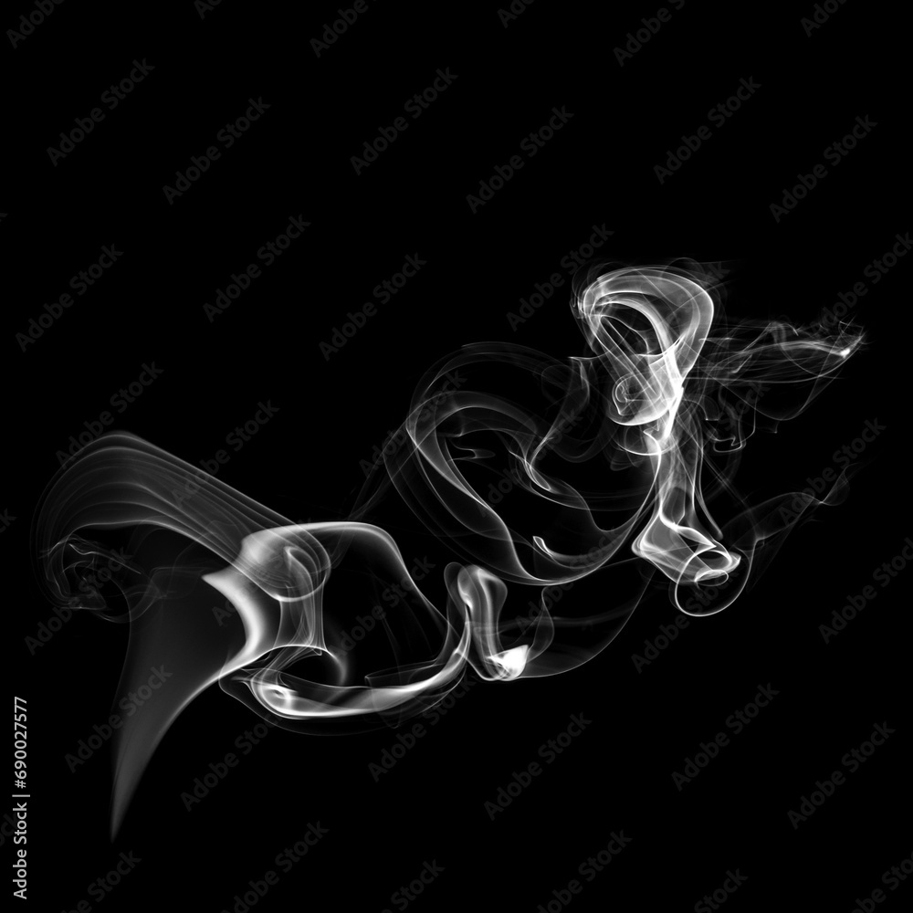 Abstract white puffs of smoke swirl overlay on black background ...