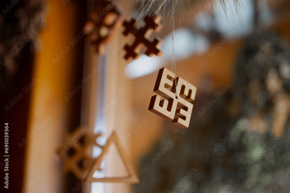 Wooden cut Latvian national pagan symbols cut in wood. National legacy ...