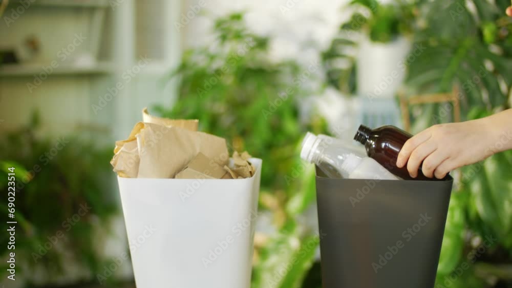 waste sorting at home. close up video female hand putting plastic ...