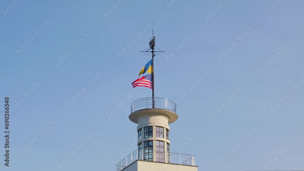 Kyiv river port. Waving flags. The arrival of an American ship at the ...