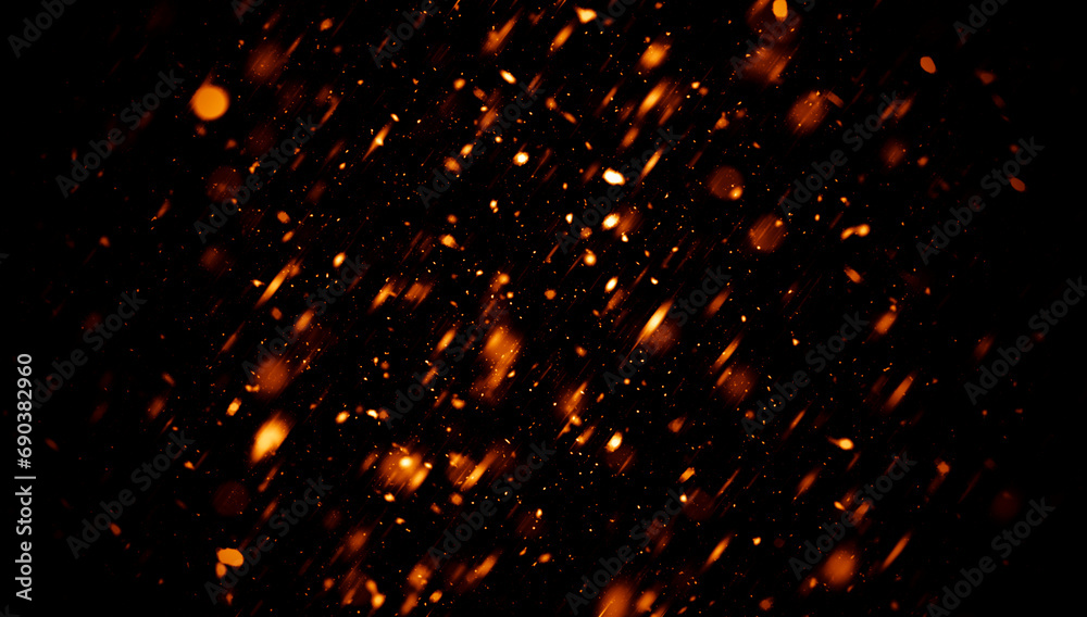 Blurred fire embers sparks on black background . Texture isolated ...