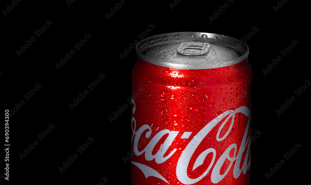 Aluminum can of Coca-Cola with water drops isolated on black background ...