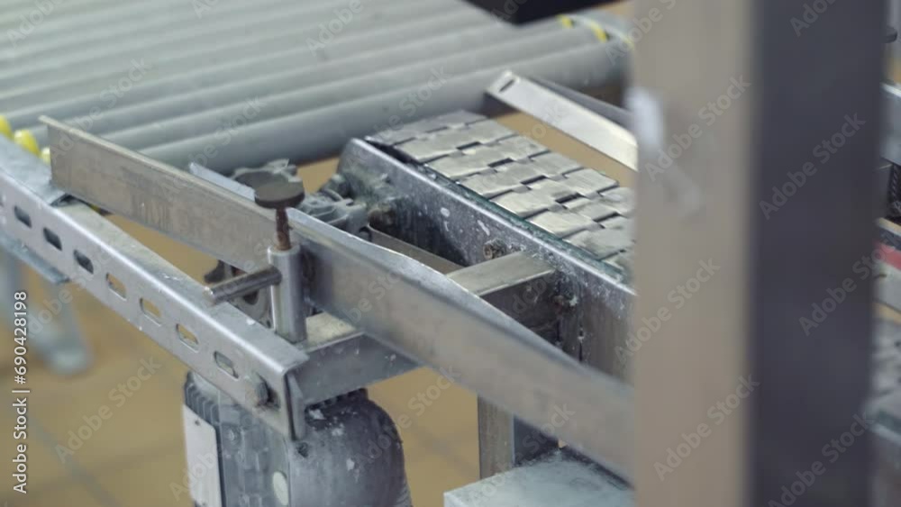 A Close-up of an empty conveyor line at the Industrial Dairy Facility ...