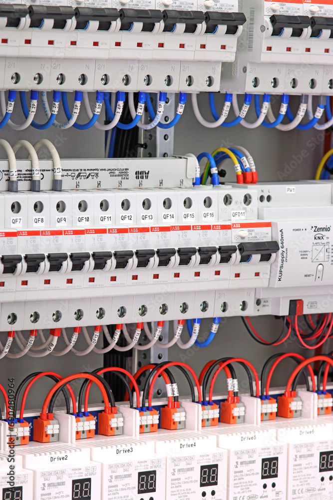 Electronic control modules for apartment automation are installed in an ...