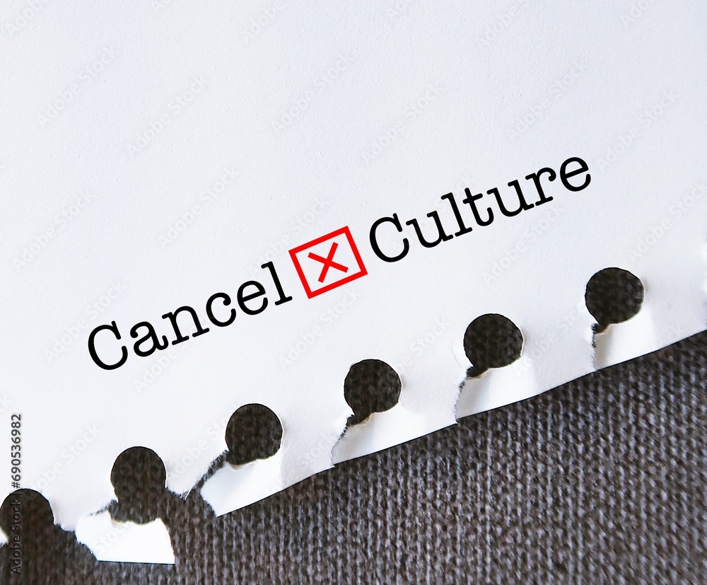 Torn paper with text written Cancel Culture - refers to mass withdrawal ...
