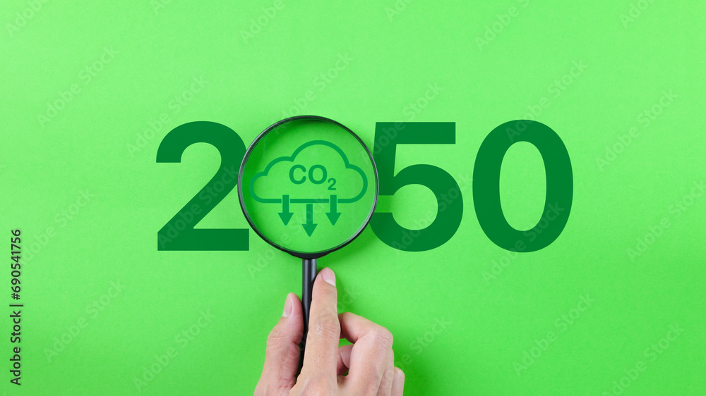 Carbon reduce emission concept, Hand holding Magnifying glass with CO2 ...