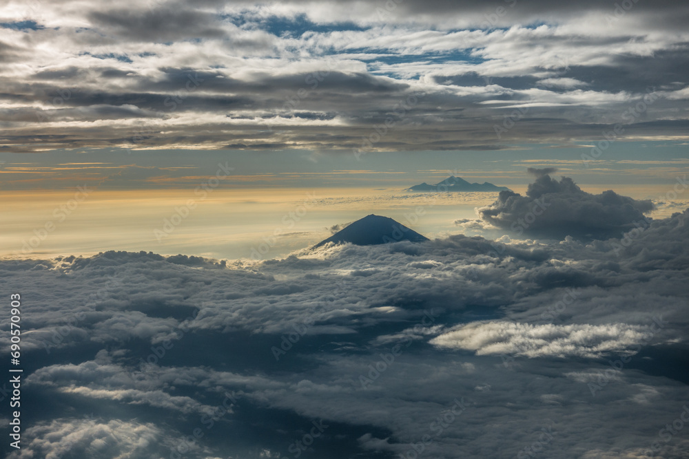 Plane view on Bali and Lombok island, Indonesia with complex cloud ...