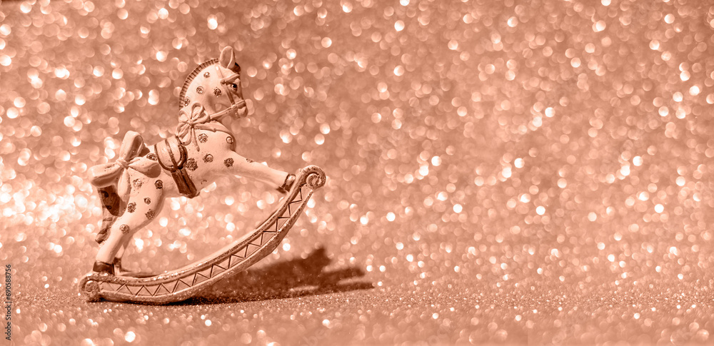Festive composition. Vintage rocking horse figurine standing on a ...