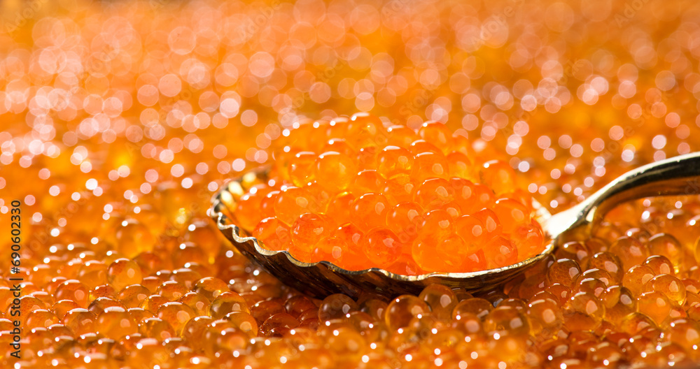 Red Caviar in a spoon. Caviar background. Fish roe, Close-up salmon or ...
