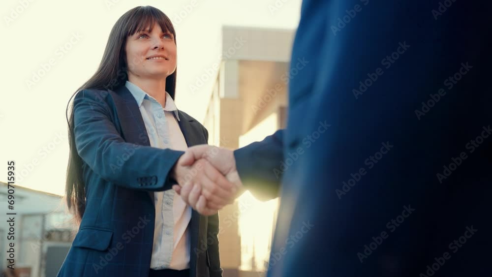 Business people shaking hands, working as team. Business woman shaking ...