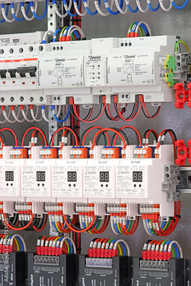 Electronic control modules for apartment automation are installed in an ...