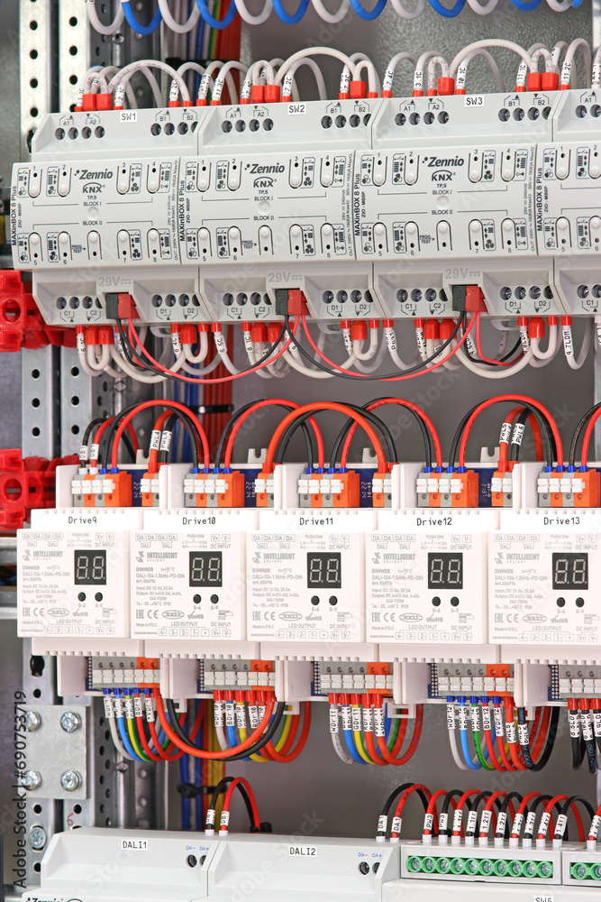 Electronic control modules for apartment automation are installed in an ...