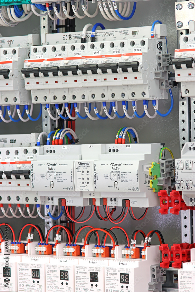 Electronic control modules for apartment automation are installed in an ...