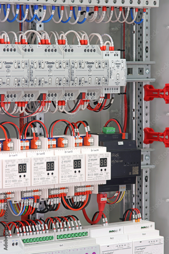 Electronic control modules for apartment automation are installed in an ...