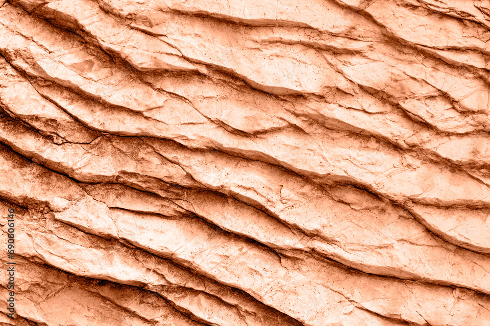 Peachy rock or stone surface. Background, texture. Color of the year ...