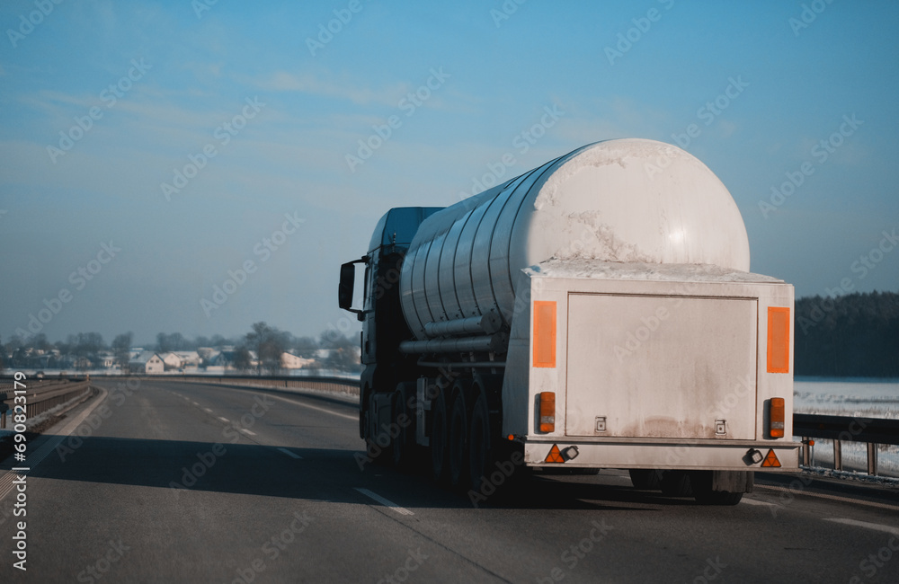 Petrol Cargo Truck Driving On Highway Hauling Oil Products. Fuel ...