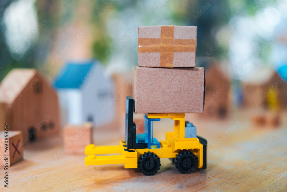 Delivery toy truck with brown package box. Online delivery service ...