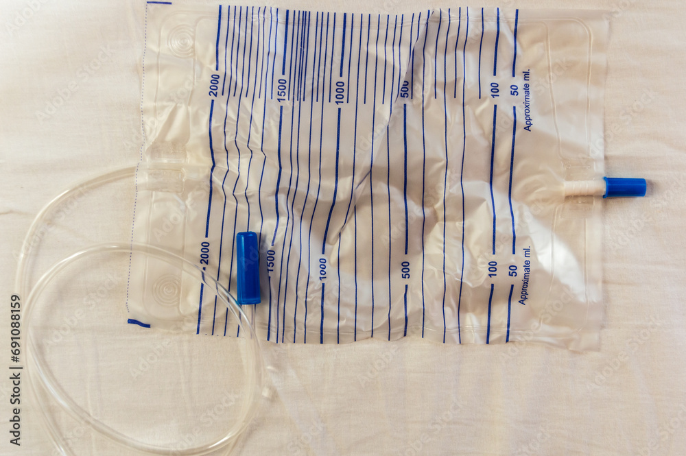 Yellow latex Foley catheter and urine drainage bag collect urine for ...