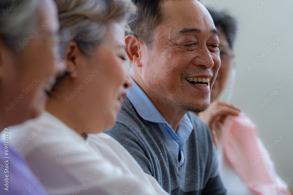 Happiness of the group females and male elderly talking with Video Call ...
