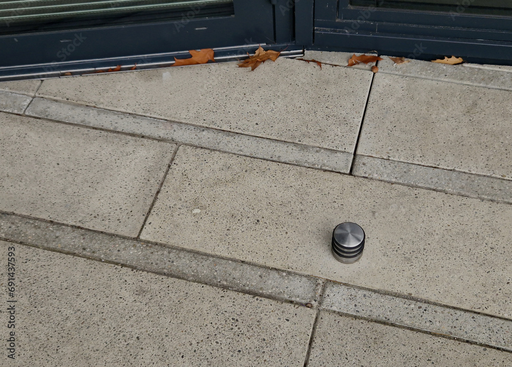 stainless steel door stop. concrete tile with rubber post in the shape ...