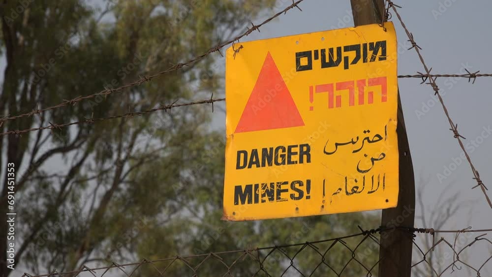 Warning sign against old landmines (from the 1950s and 1960s), written ...