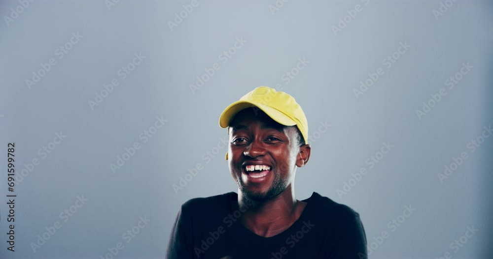 Man, face and laugh in studio with happy expression, cheerful joke and ...