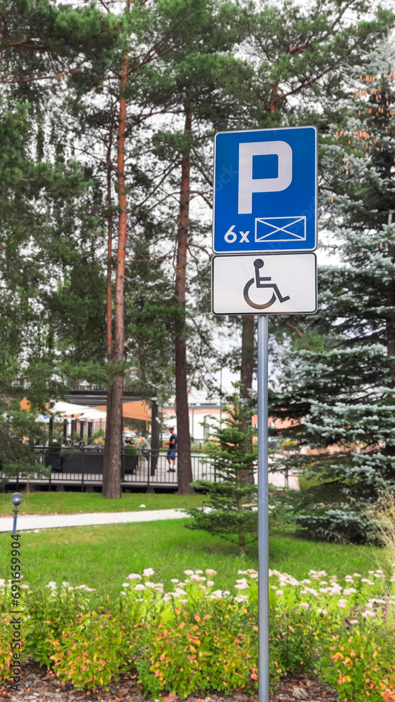 Road sign Disabled Parking in park near shopping mall. Concept of ...