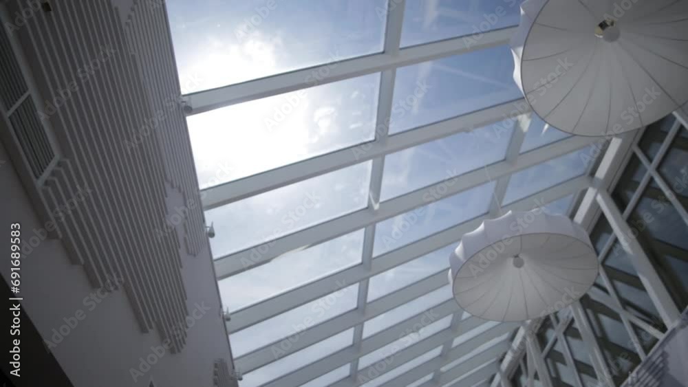 Viiew of the sun and blue sky through the window slide motion ...