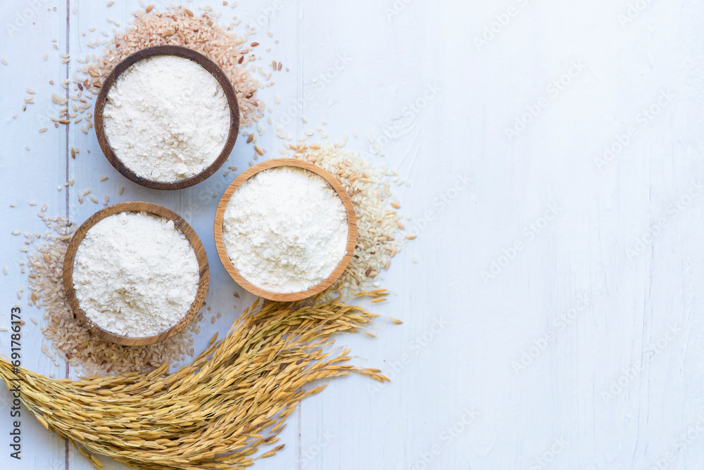 Rice flour in wooden bowl with white rice, Thai Native rice, rice ears ...