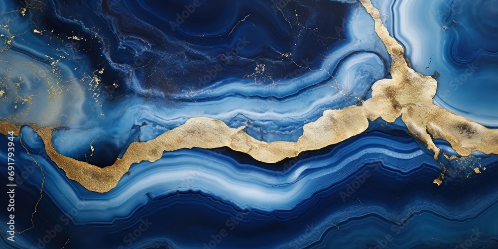 Rich blue and gold geode patterns swirl together, creating a natural ...