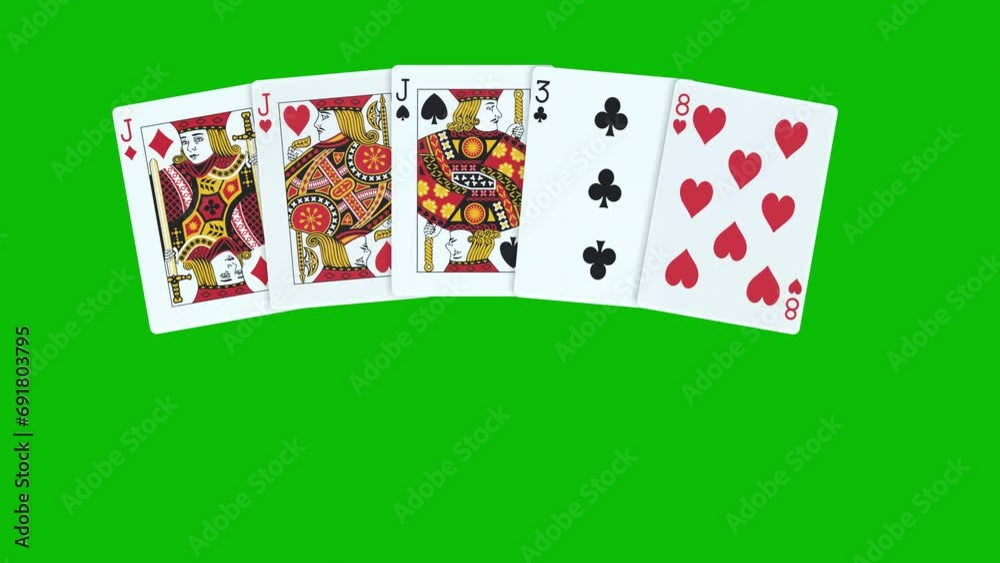 A poker hand consisting of three of a kind J, with cards thrown one by ...