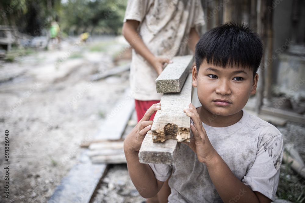 Concept of child labor, poor children being victims of construction ...