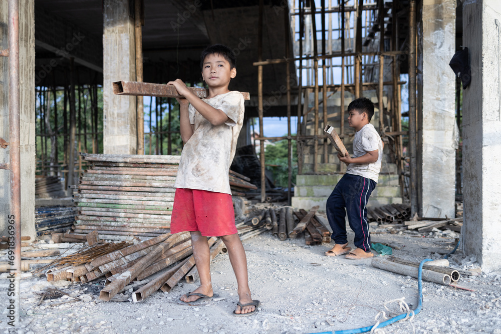 Concept of child labor, poor children being victims of construction ...