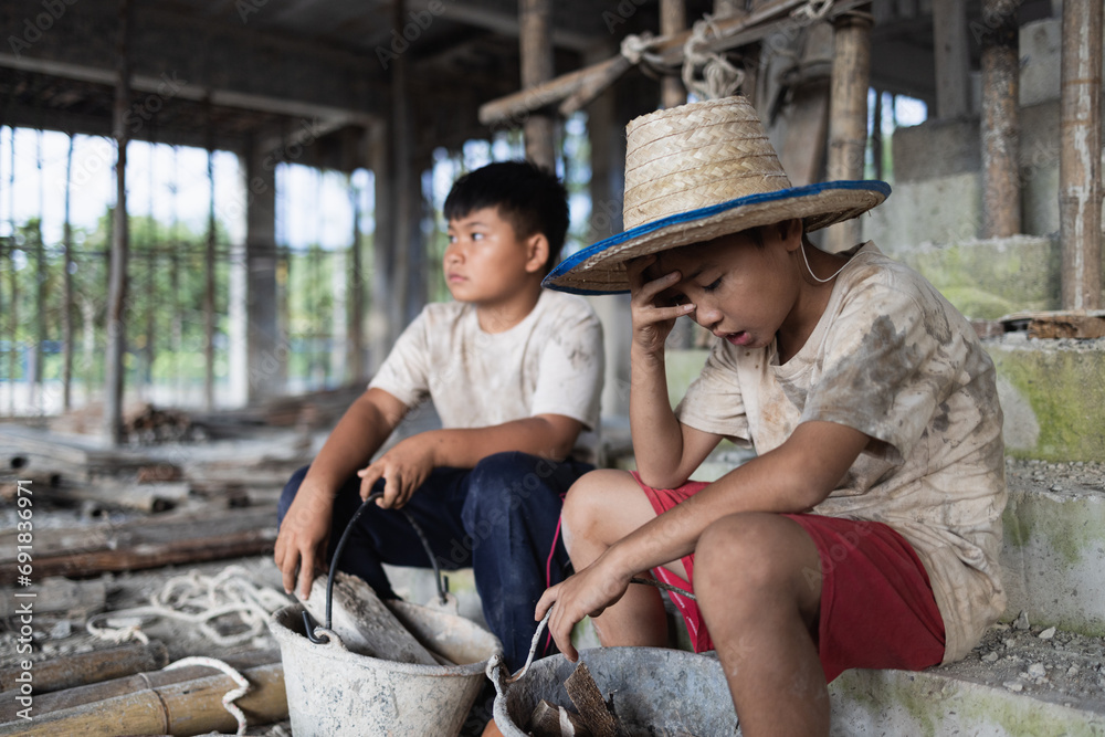 Concept of child labor, poor children being victims of construction ...