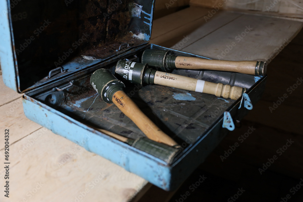 World War II german fragmentation grenades stacked in a military box on ...
