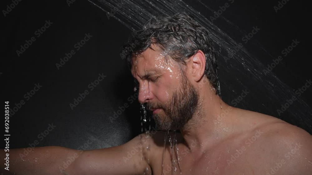 Millennial Man Washing Hair In Bath Guy Bathing Shower Head In Bathtub Face In Foam In Shower