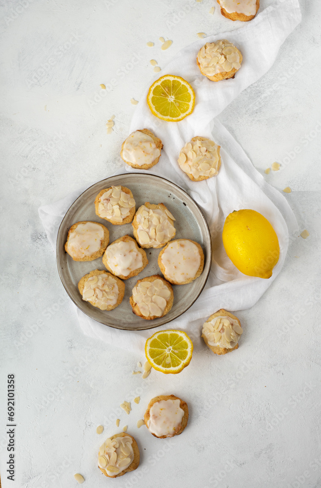 Homemade Italian lemon shortbread cookies with glaze and almond ...