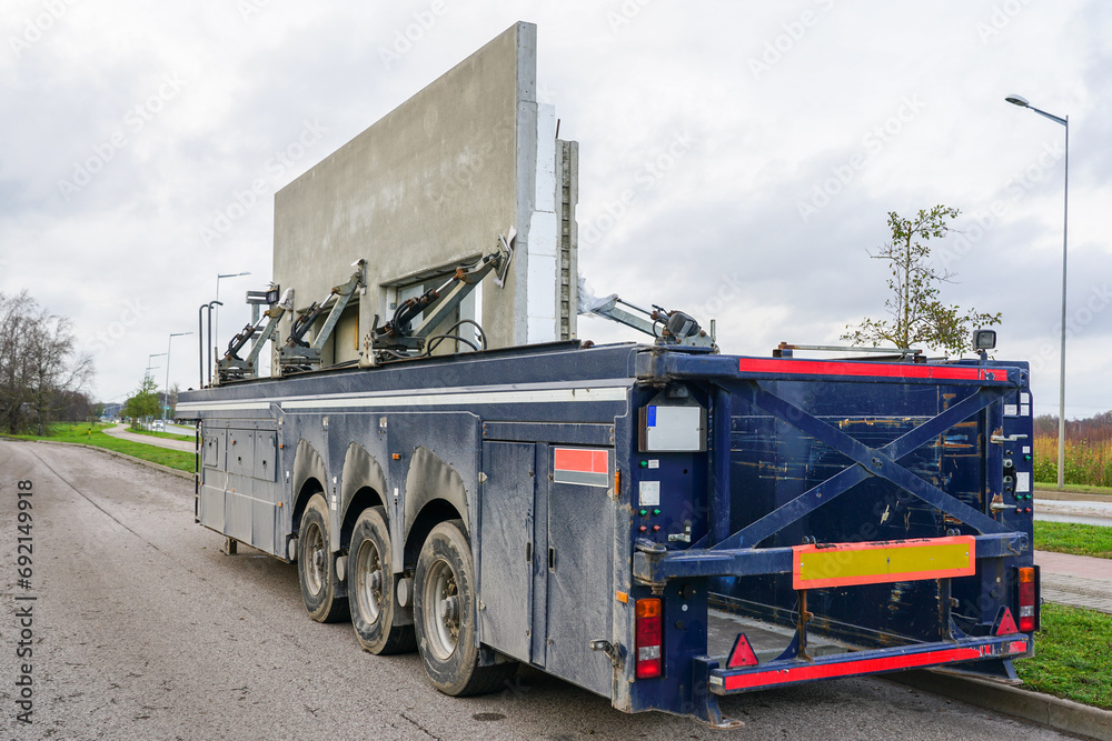 Transportation of reinforced concrete precast wall panels with a ...
