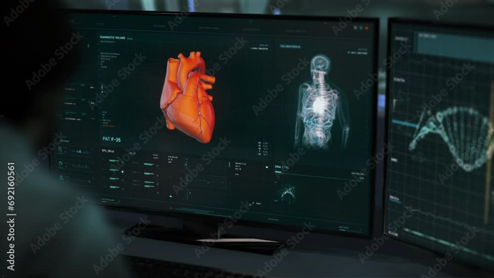 Doctor is controlling the x-ray scanning process of the patients chest ...