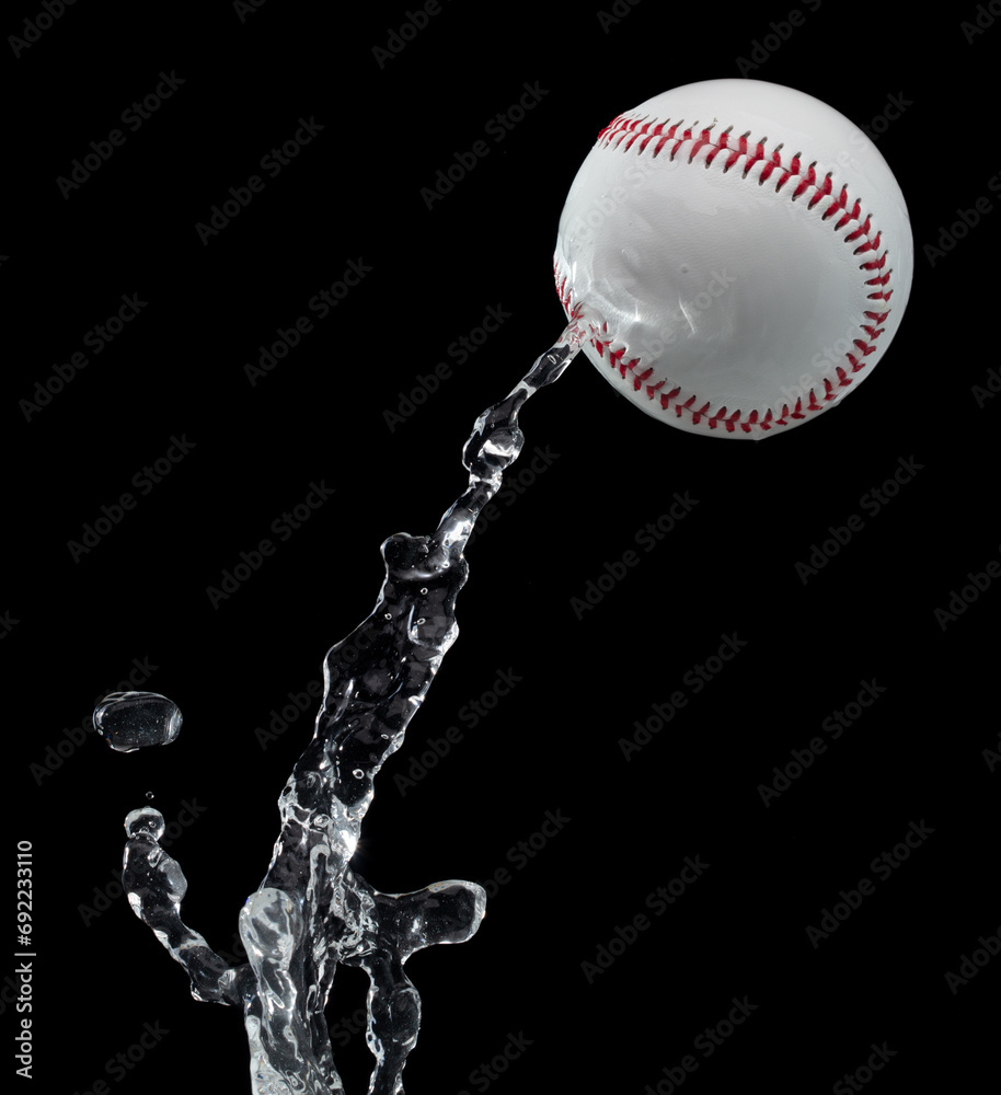 Baseball ball hit water and splash in air. Baseball ball fly in rain ...